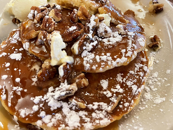 This caramel nut pancake isn't just breakfast&mdash;it's dessert with an alibi. The powdered sugar dusting provides plausible deniability for morning decadence.