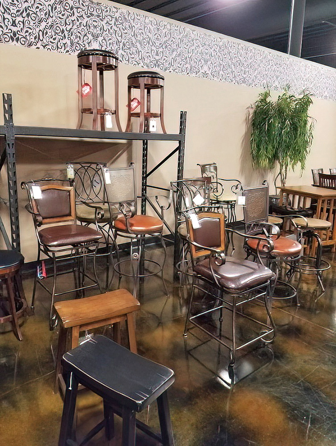 Bar stools and dining chairs create a forest of seating options, proving that sometimes the hardest part of furniture shopping is simply deciding where to sit first.