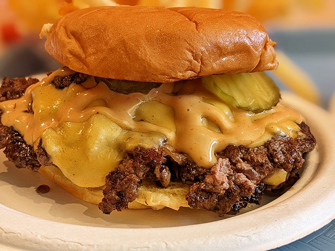 This isn't just a cheeseburger—it's a masterclass in melty perfection that makes you question every other burger you've ever loved.
