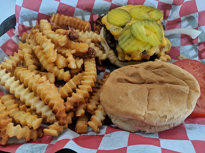 This isn't just a burger and fries &ndash; it's edible therapy on a red-checkered paper that whispers, "Everything's gonna be alright."