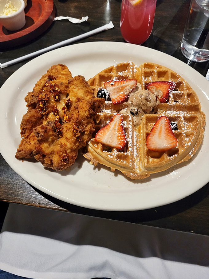 The holy matrimony of crispy and fluffy! These chicken and waffles don't need a prenup&mdash;they're committed to making your taste buds dance with joy.