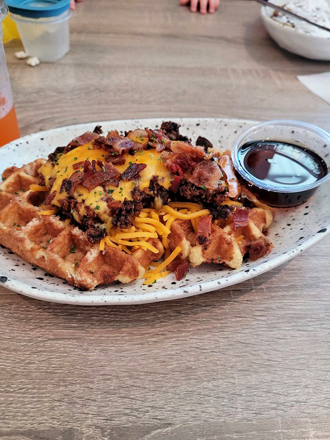 Behold: the dish that launches road trips. This chicken and waffle masterpiece has more layers of flavor than your favorite binge-worthy drama series.