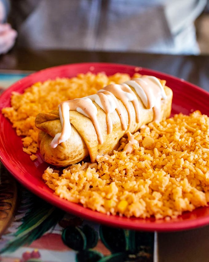Golden, crispy perfection on the outside, tender filling within – this chimichanga is the culinary equivalent of striking oil in New Hampshire.