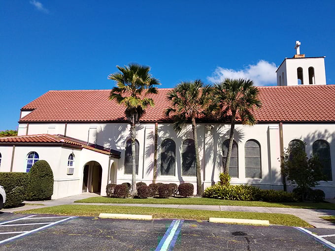 This Spanish-influenced church offers spiritual sanctuary under Florida's endless blue skies, its terra cotta roof tiles baking peacefully in the sunshine.
