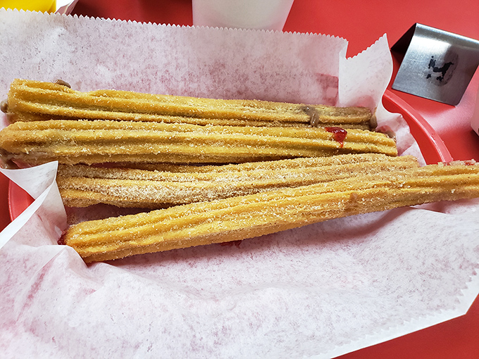 Golden, crispy, cinnamon-sugar coated perfection. These churros aren't just dessert&mdash;they're the reason GPS was invented: to help you find your way back.