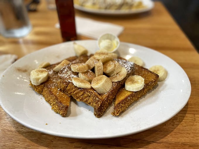 French toast that doesn't just whisper "cinnamon"&mdash;it belts it out like Aretha Franklin, complete with a banana backup chorus.