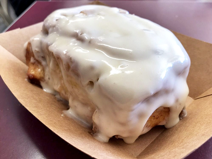 This cream cheese frosted beauty isn't just a cinnamon roll&mdash;it's what clouds must taste like if they were made of butter, sugar, and childhood dreams.