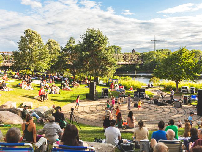 Childhood wonder meets golden hour magic. Two young explorers discover that the best sunset views in Eau Claire come with wet feet and priceless memories. 