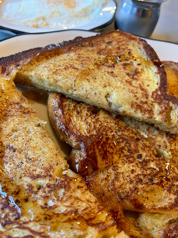 Golden-brown perfection that makes other French toast look like soggy bread. This isn't breakfast&mdash;it's a religious experience with maple syrup.