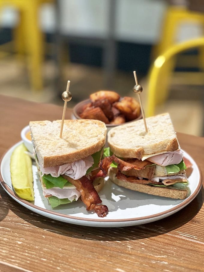 The club sandwich that makes you question all other club sandwiches you've ever committed to&mdash;layered perfection with a pickle sidekick.