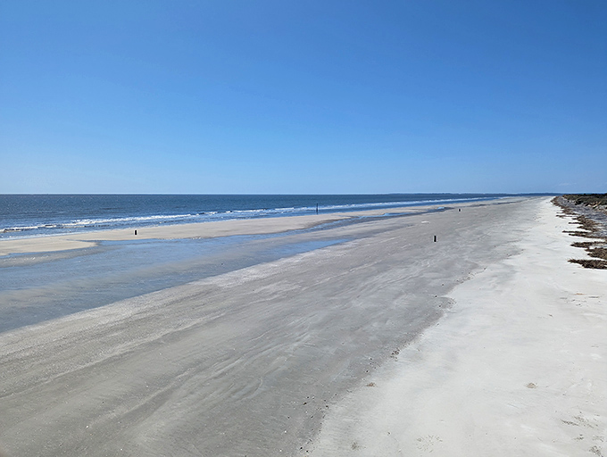The highway of tides. Low tide reveals a marbled shoreline where the Atlantic seems to have momentarily retreated just to give you more room to wander.
