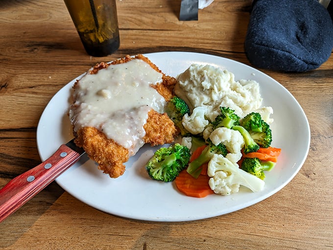 Country fried steak that's crispy on the outside, tender inside, and smothered in gravy that would make your grandmother jealous.