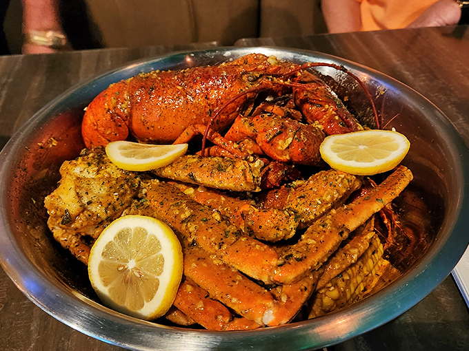 Seafood nirvana arrives in a metal bowl&mdash;spice-crusted crab legs and lobster with bright lemon wedges cutting through the richness like sunshine after rain.