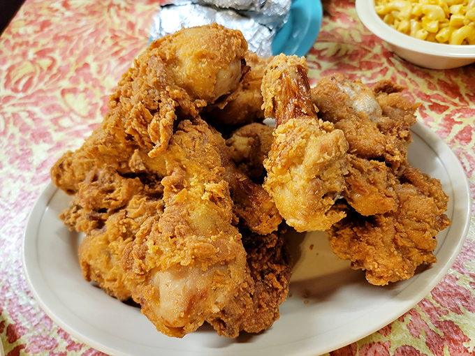 Golden-brown perfection that makes you understand why people drive across state lines. This isn't just chicken&mdash;it's edible nostalgia.