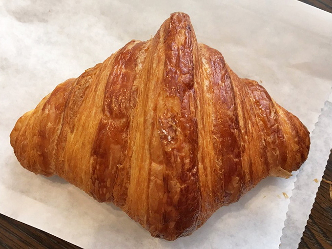 Behold the golden geometry of perfection. This isn't just a croissant; it's what other croissants dream of becoming when they grow up.