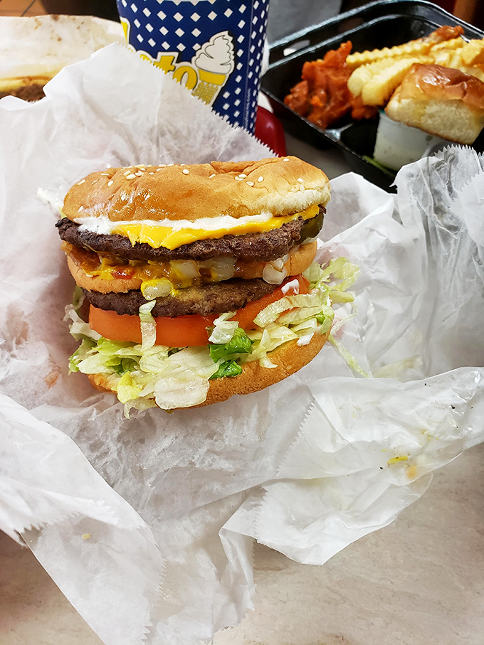 The Chubby Decker doesn't just satisfy hunger—it demolishes it. Multiple beef patties, cheese, and veggies create a towering monument to American excess.