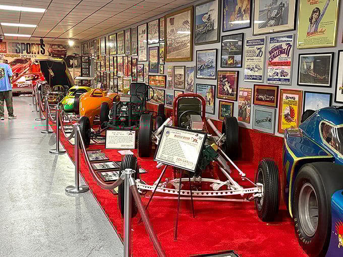 Racing history, preserved like insects in amber. Each vehicle tells a story of split-second decisions and engineering breakthroughs.