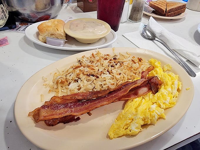 Breakfast perfection doesn't need fancy plating. Those hash browns have the ideal crisp-to-tender ratio that chain restaurants have spent millions trying to replicate.