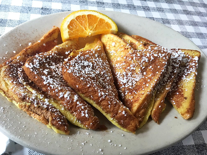 Golden-edged French toast that's achieved celebrity status in Portland. That dusting of powdered sugar? The breakfast equivalent of fairy dust.