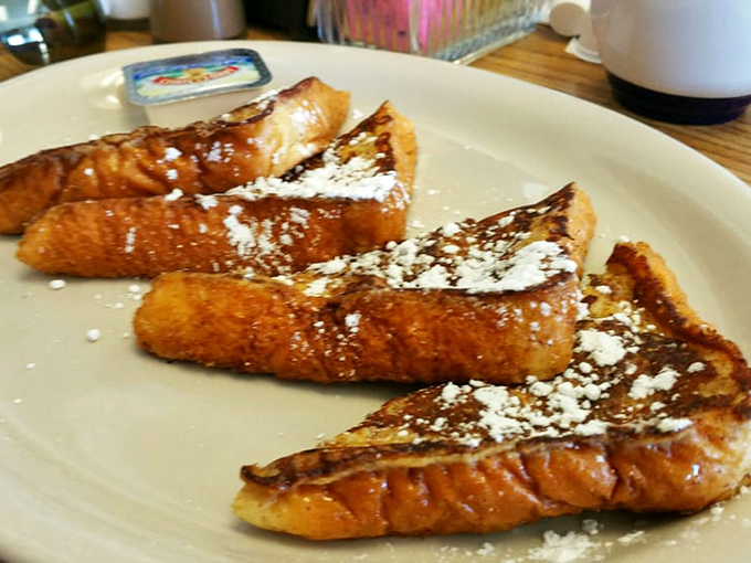 Golden-brown French toast dusted with powdered sugar&mdash;the kind that makes you wonder why anyone bothers with fancy brunch. Simple perfection on a plate