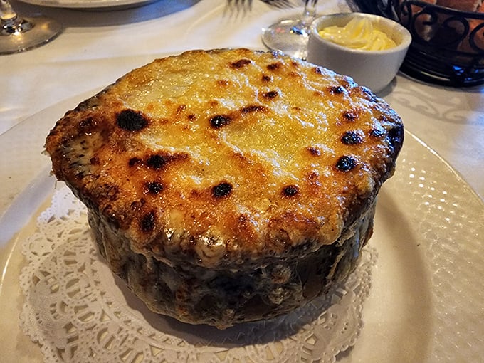 Behold, the holy grail of comfort food&mdash;French onion soup with a crown of golden, bubbling Gruy&egrave;re that stretches with each spoonful like a cheese lover's dream.