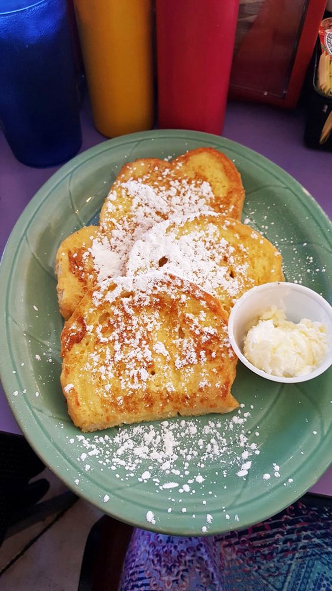 Golden perfection dusted with powdered sugar. This French toast doesn't need a passport to transport you to breakfast nirvana.