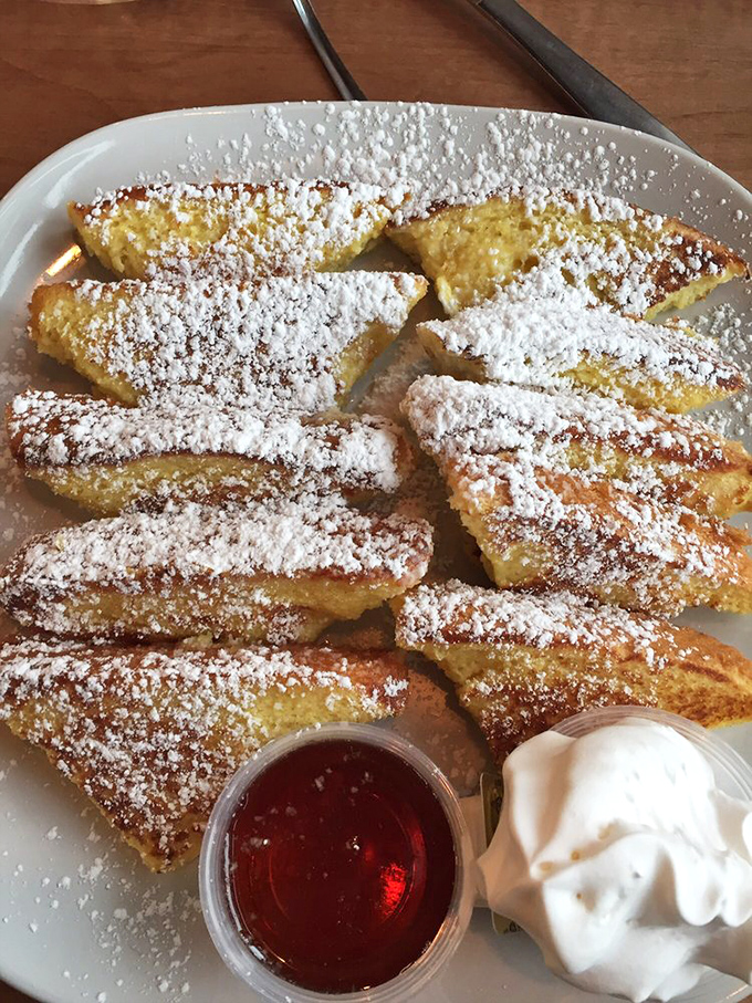 French toast triangles dusted with powdered sugar—proof that someone in this kitchen understands that breakfast should occasionally masquerade as dessert.