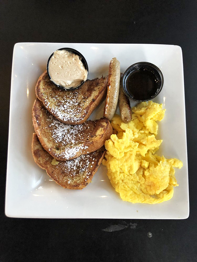 Berry-topped French toast that makes you wonder if dessert for breakfast is actually the secret to happiness that philosophers missed.