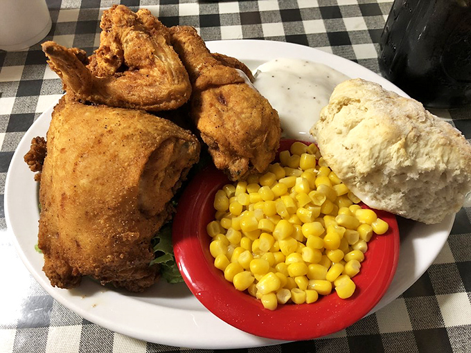 Golden-brown perfection that makes you understand why people cross county lines. This crispy-juicy masterpiece with sweet corn and a biscuit is Branson's edible gold.