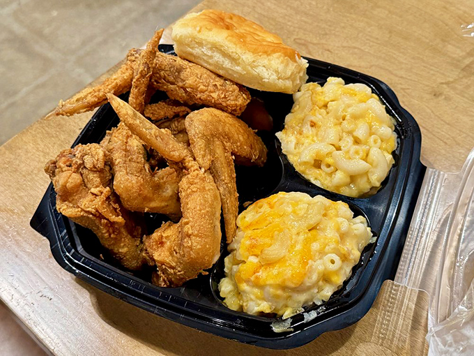 Golden-fried chicken that shatters with each bite, paired with mac and cheese so creamy it should be illegal in at least nine states.