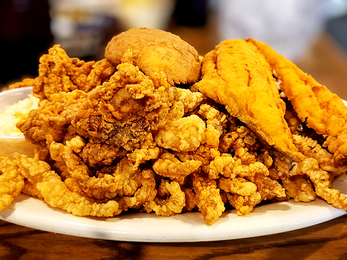 Golden mountains of fried clam strips that would make Neptune himself weep with joy. Crispy outside, tender inside &ndash; seafood perfection on a plate.