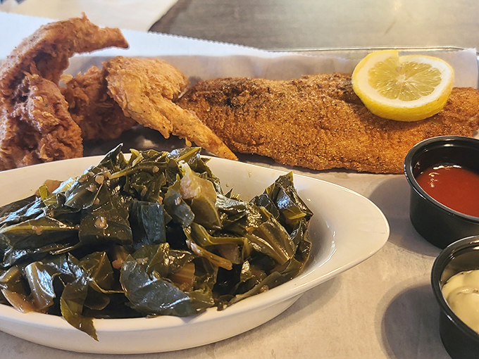 Crispy catfish with a cornmeal crust that shatters just right, alongside collard greens so flavorful they might make your grandma jealous.