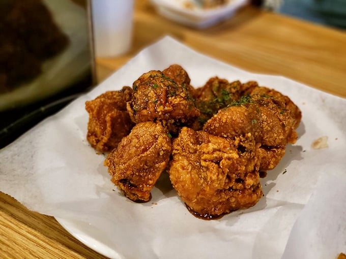 Garlic soy chicken sporting a burnished mahogany coating that shatters on first bite. This isn't just dinner &ndash; it's a percussion instrument for your mouth.