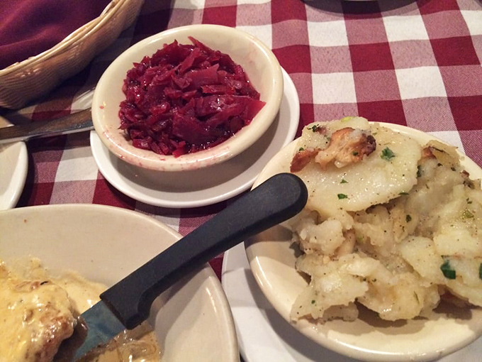 Red cabbage and German potato salad&mdash;the dynamic duo of side dishes. One vibrant and tangy, the other a bacon-studded masterpiece that puts American versions to shame.