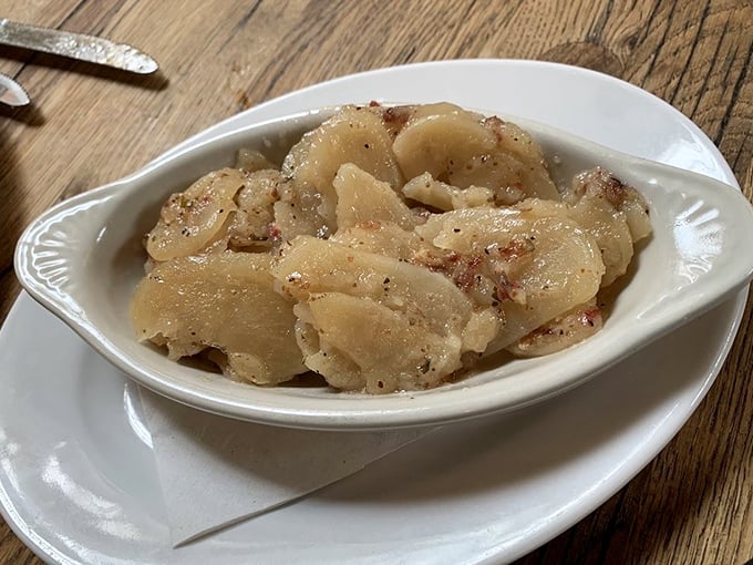 This isn't your picnic potato salad. Warm, vinegary, bacon-studded perfection that would make your German grandmother weep with pride.