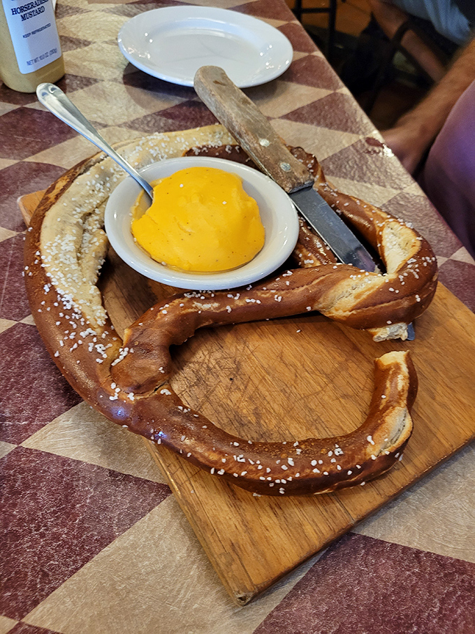 Behold the pretzel mothership! This golden-brown beauty with its center bowl of liquid gold cheese isn't just a snack&mdash;it's an engineering marvel of carb architecture. Photo credit: <a href="https://maps.google.com/maps/contrib/117078419973679420956" target="_blank" rel="noopener noreferrer">Lisa Marie</a>