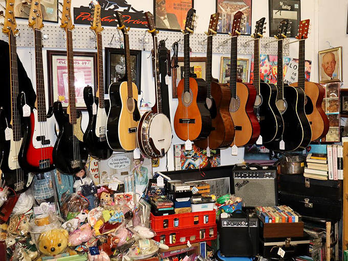 A guitar collector's nirvana. Each instrument hanging here has probably played more interesting songs than whatever's on the radio right now.