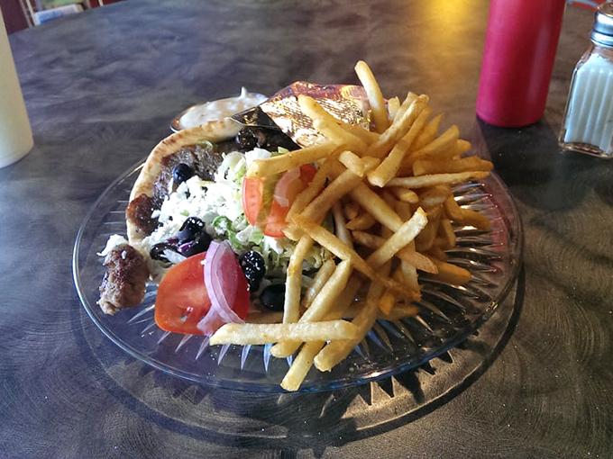 A gyro that demands to be photographed before eaten, though your patience will be tested with those aromas wafting upward.