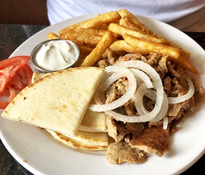 This isn't just a gyro&mdash;it's a masterclass in balance. Tender meat, fresh veggies, and that tzatziki sauce that makes everything better.