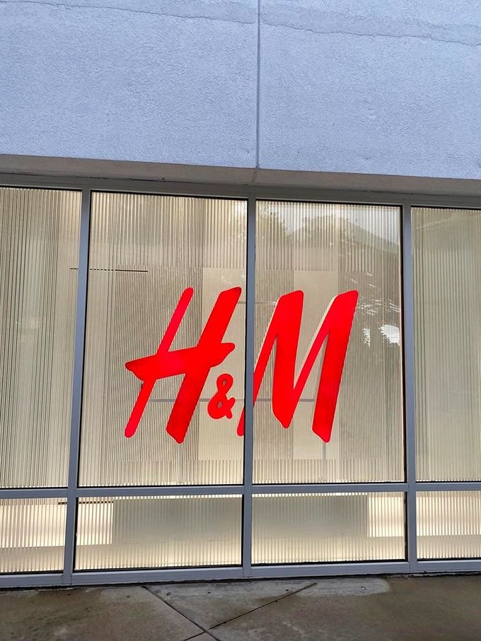 H&M's bold red signage cuts through the retail noise like a declaration: "Yes, we have what you're looking for, and yes, it's cheaper here."
