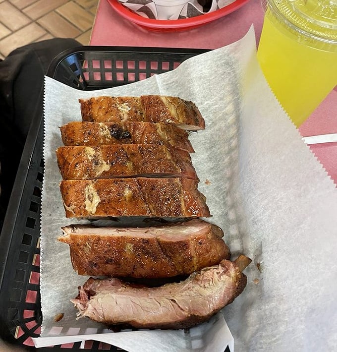 Behold the half rack of ribs in all their glory! That bark, that smoke ring, that juicy meat&mdash;this is what barbecue dreams are made of.