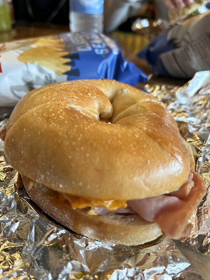 This isn't just a bagel sandwich; it's a perfect circle of happiness wrapped in foil. The cheese melts with such commitment it deserves a loyalty award.