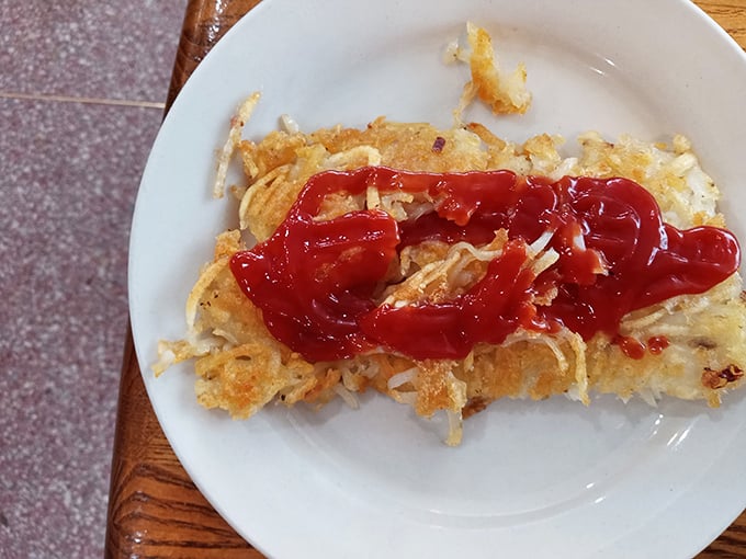 Golden hash browns with a splash of ketchup&mdash;simple perfection that needs no fancy description. Sometimes the most basic pleasures are the ones we drive miles to experience again.