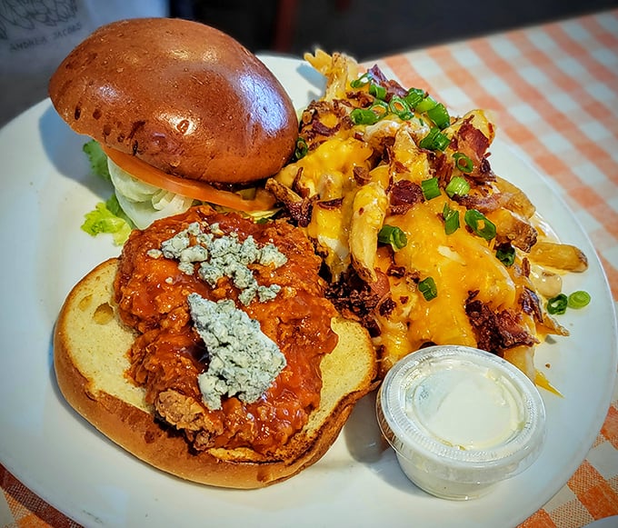 This isn't just a sandwich; it's an architectural marvel of crispy chicken, melty cheese, and loaded fries that makes calorie counting seem like buzzkill math.