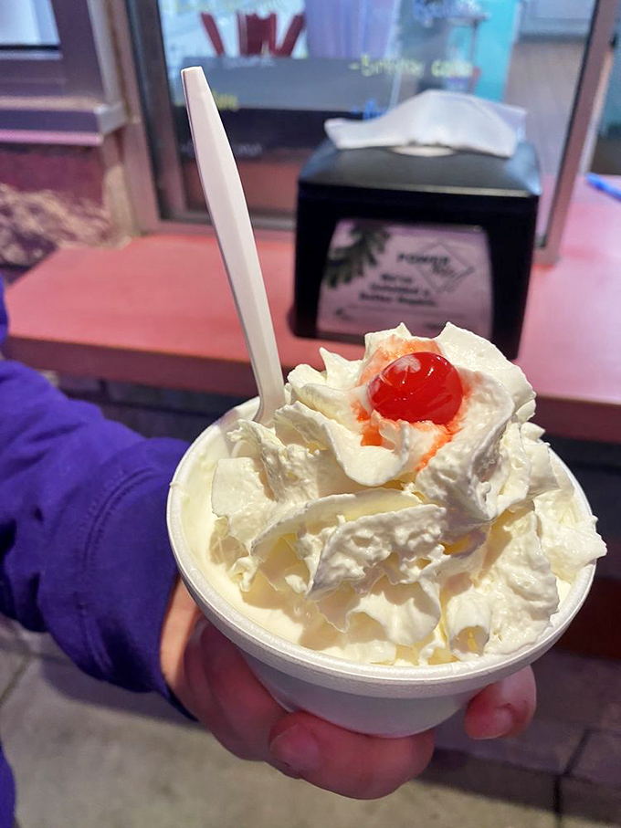 This isn't just whipped cream&mdash;it's a cloud-like throne for that maraschino cherry, royalty in the kingdom of sundaes.