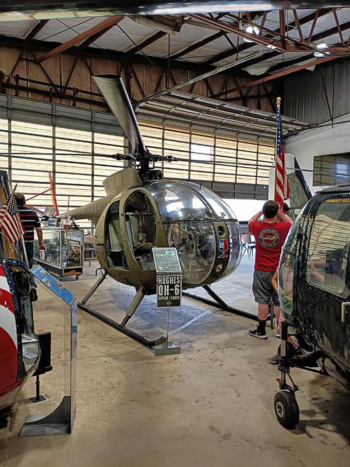 Step inside and meet the Hughes OH-6, a helicopter that's seen more action than most Hollywood stunt doubles. The bubble cockpit practically invites you in.