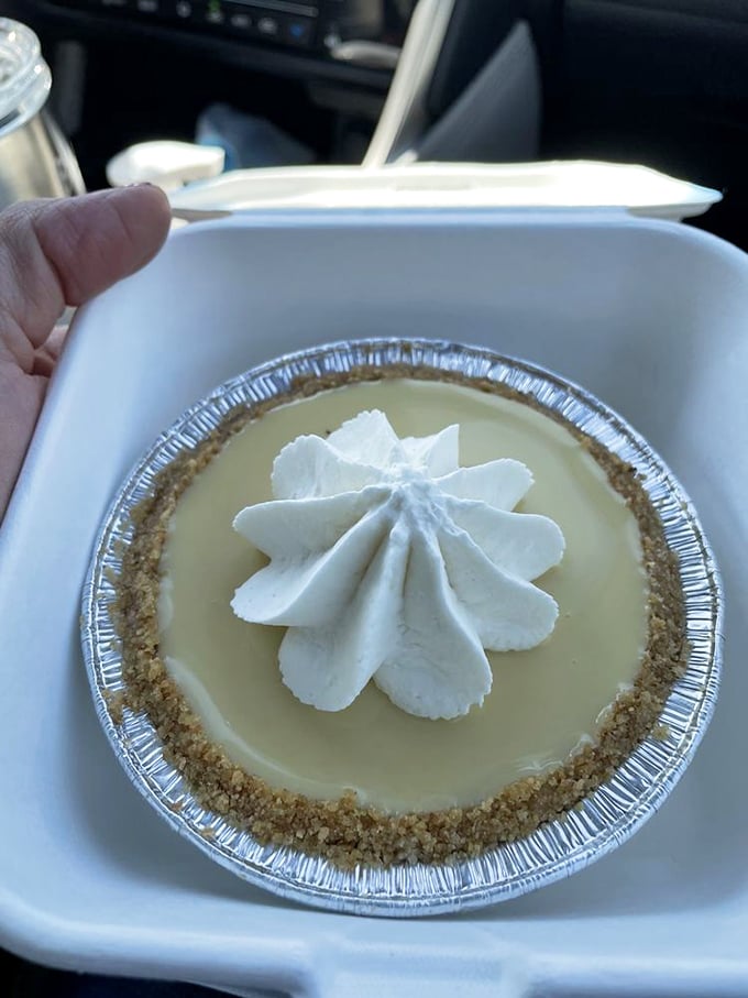 The perfect key lime mini&mdash;a palm-sized flavor bomb topped with a whipped cream rosette. Small enough to justify, large enough to satisfy.