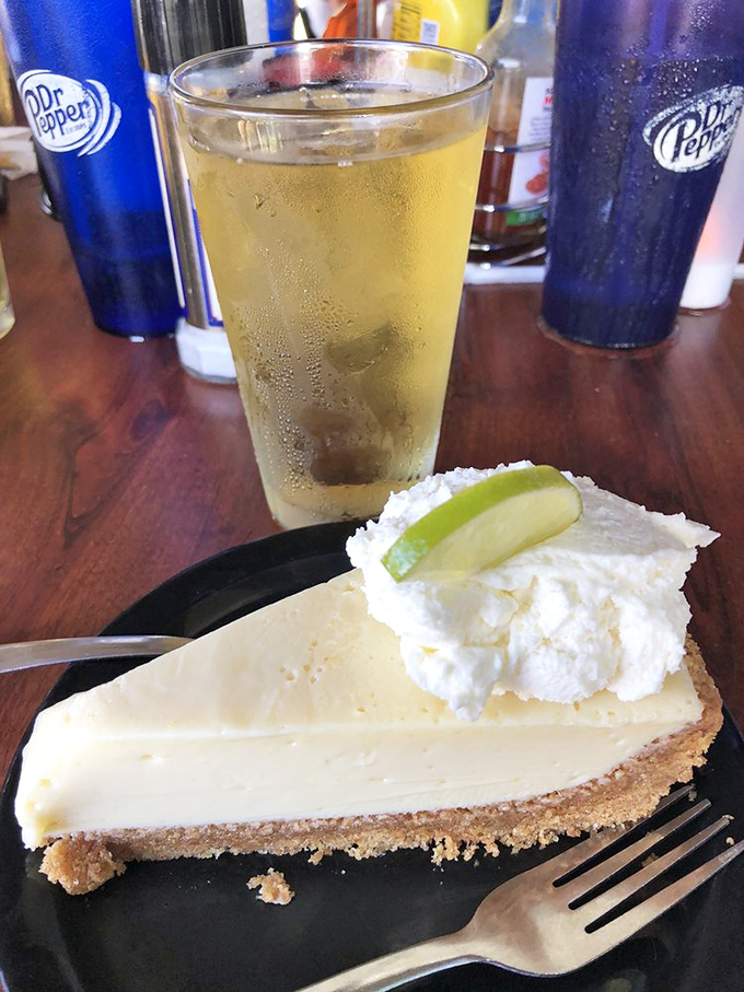 Key lime pie nirvana has been achieved. That pale yellow filling, billowy whipped cream, and perfect graham cracker crust create the holy trinity of dessert perfection.