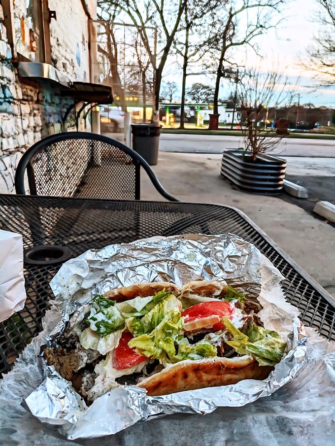 Foil-wrapped perfection that makes you question every other gyro you've ever eaten. The outdoor seating turns Atlanta's sidewalk into your own private Greek island.