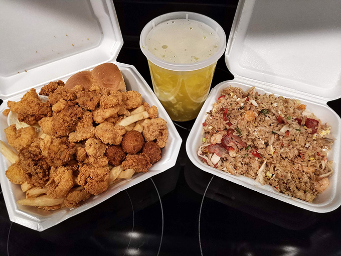 Take-out heaven: golden fried shrimp nestled against crispy fries, with seafood fried rice that could make your grandmother jealous, all washed down with sweet tea.